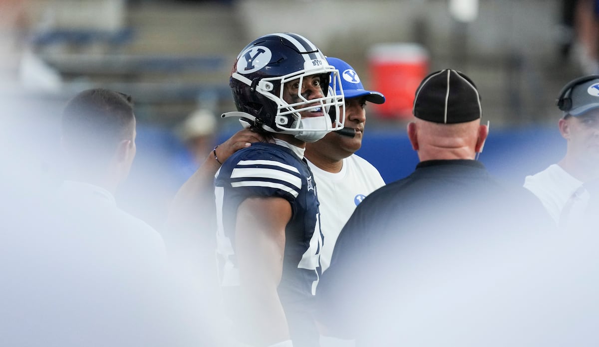 BYU football player Kalani Sitake limits the impact of Michigan's Kyle ...